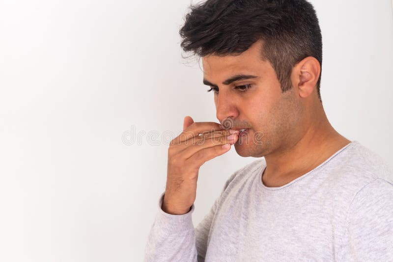 Stressed Man Biting Finger Nails on Isolaned Background Stock Image ...