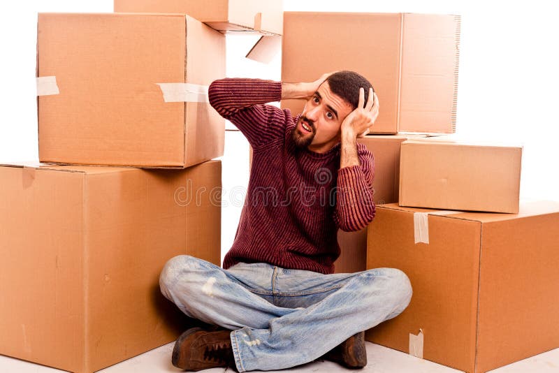 Stressed Man between Boxes stock photo. Image of casual - 17172278