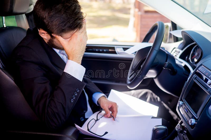 Stressed man in a car stock photo. Image of automobile - 94757014