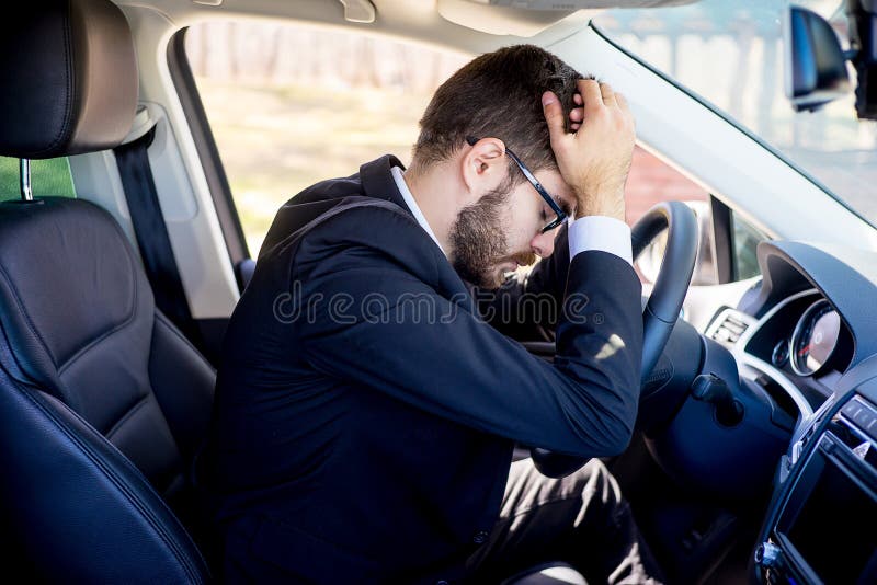 Stressed man in a car stock image. Image of sleep, casual - 94953175