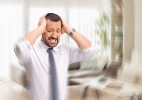 Stressed Man with Headache Feeling Dizzy Stock Image - Image of dizzy ...