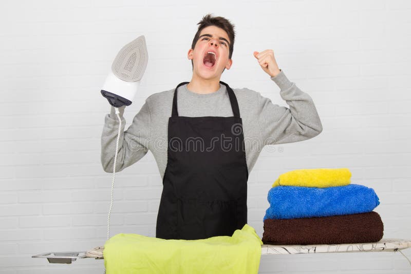 Stressed Man Ironing Clothes Stock Photo - Image of service, indoors ...