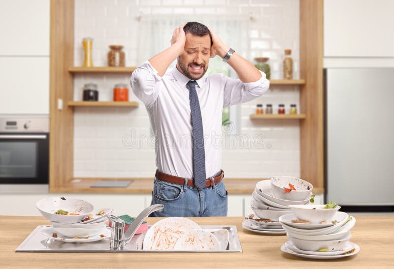 Stressed man in a kitchen stock image. Image of irritated - 375280669