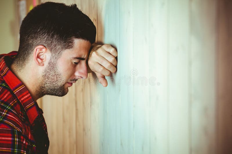 Stressed Man Leaning on Wall Stock Image - Image of cell, affection ...