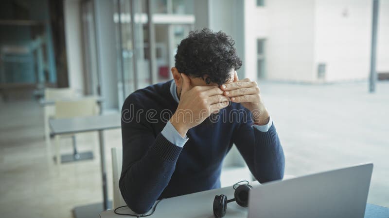 Stressed Middle-aged Man with Beard in Modern Office Covering Face ...