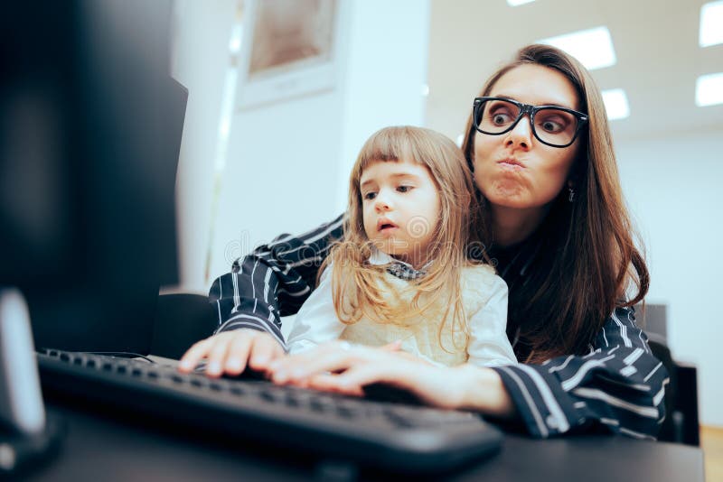Stressed Mother Trying To Work While Holding Her Daughter Stock Image