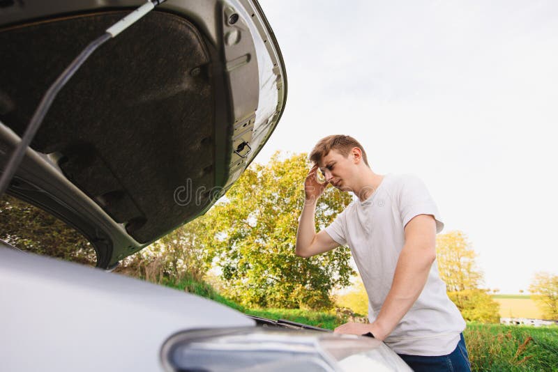 Novice Driver Holding Car Keys Out of the Window and Smiling. New ...