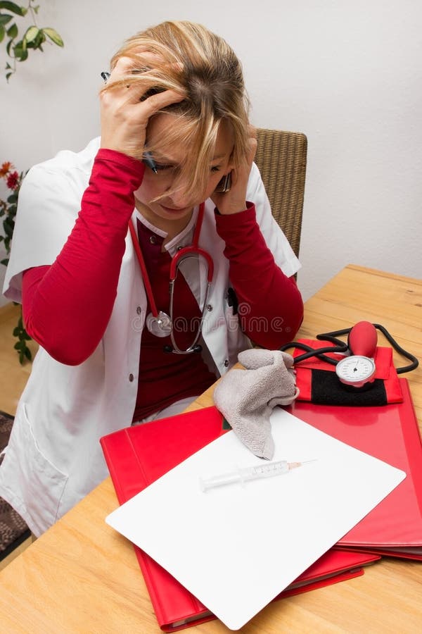 3,784 Stressed Nurse Stock Photos - Free & Royalty-Free Stock Photos ...
