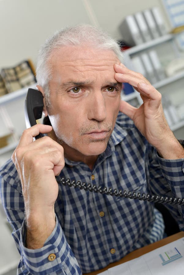 Stressed Office Worker on Phone Stock Photo - Image of desperate ...