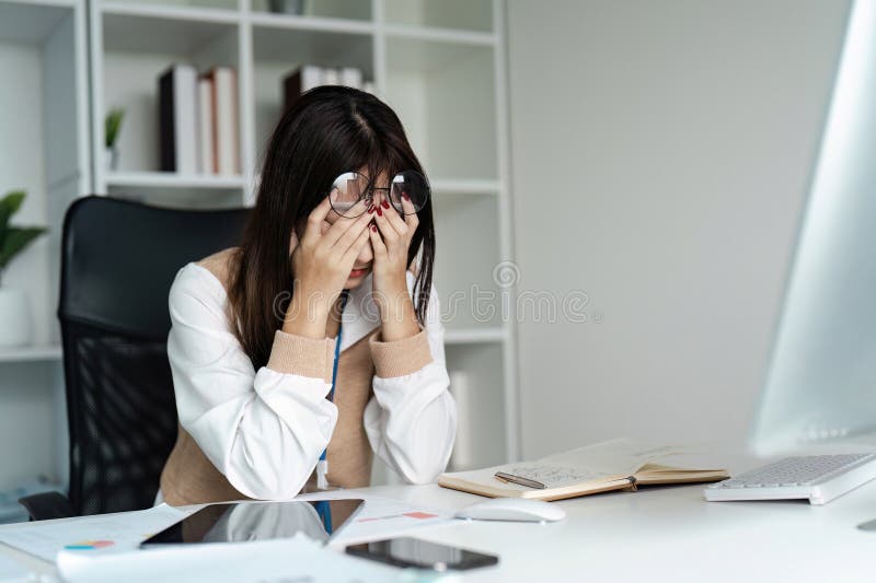 Stressed Office Worker Experiencing Office Syndrome at Desk with ...