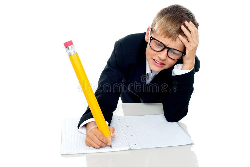 School boy working hard stock photo. Image of studious - 8328064