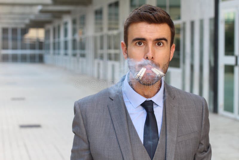 Stressed Out Chain-smoker in the Office Stock Photo - Image of ...