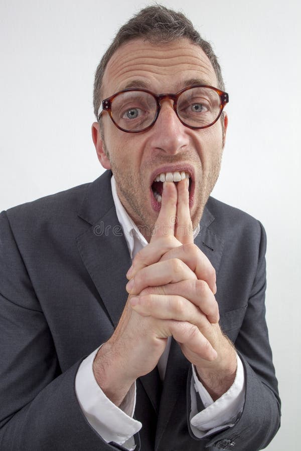 Stressed Out Manager Touching His Teeth for Corporate Question or ...