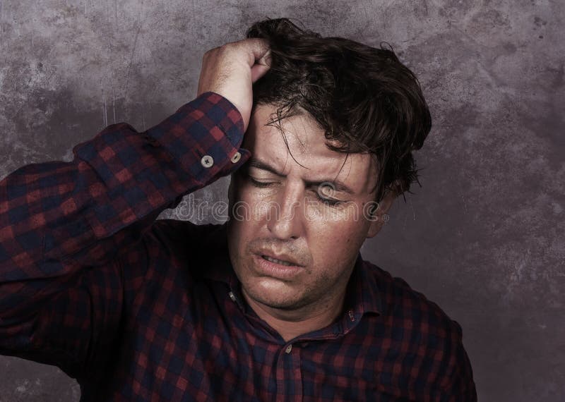 Stressed and Overwhelmed 30s or 40s White Man Holding Head with Hands ...
