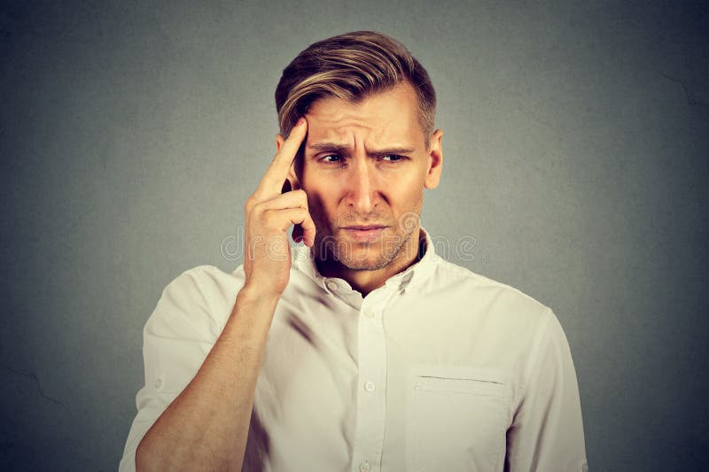 Stressed Sad Young Man Looking Down Gray Wall Background Stock Photos ...