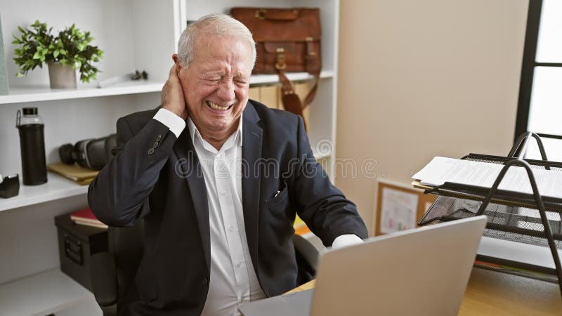 Stressed Senior Man Suffering from Cervical Pain while Working ...