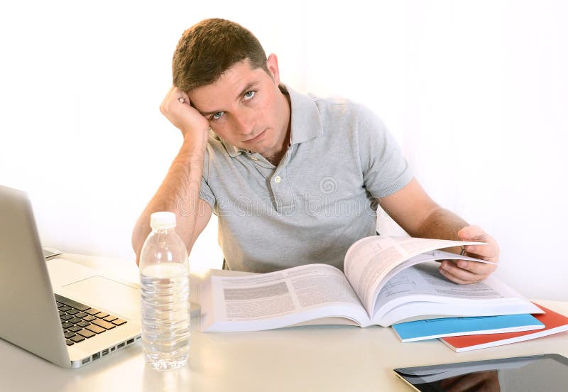 Stressed Student with Book and Laptop Stock Photo - Image of ...