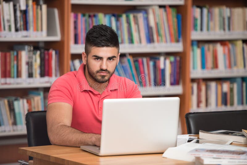 Stressed Student Doing His Homework at the Desk Stock Photo - Image of ...