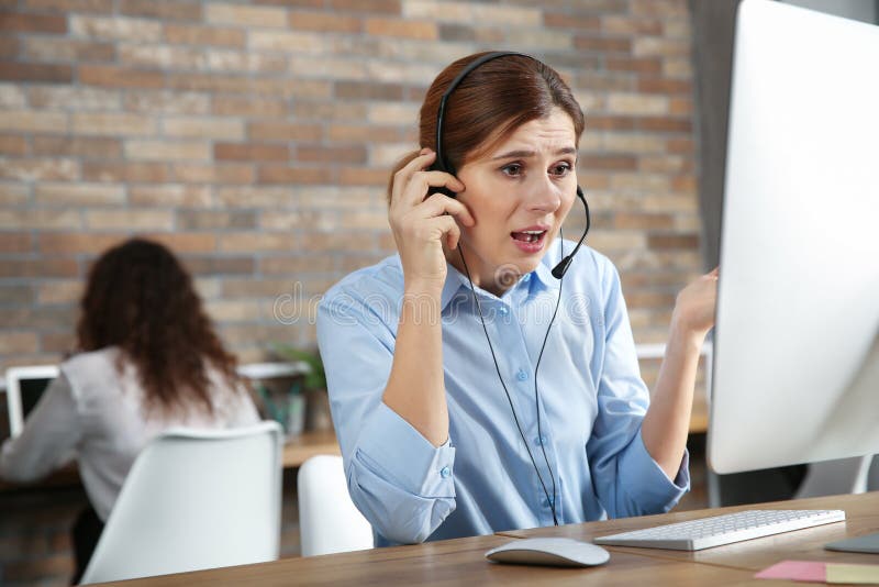 Stressed Technical Support Operator Working at Table Stock Photo ...