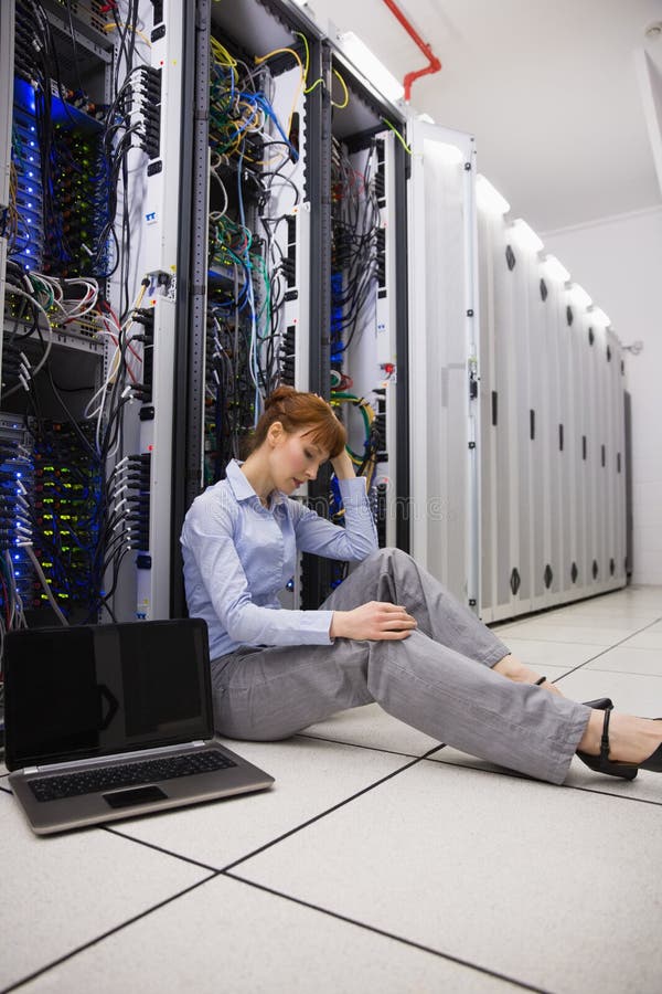Stressed Technician Sitting on Floor beside Open Server Stock Photo ...