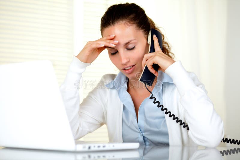 Tired Woman with Headache Speaking on Phone Stock Image - Image of ...
