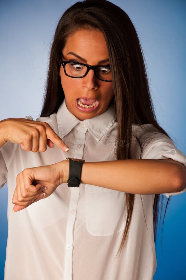 Stressed Woman Staring into Watch Gesturing Being Late Stock Photo ...