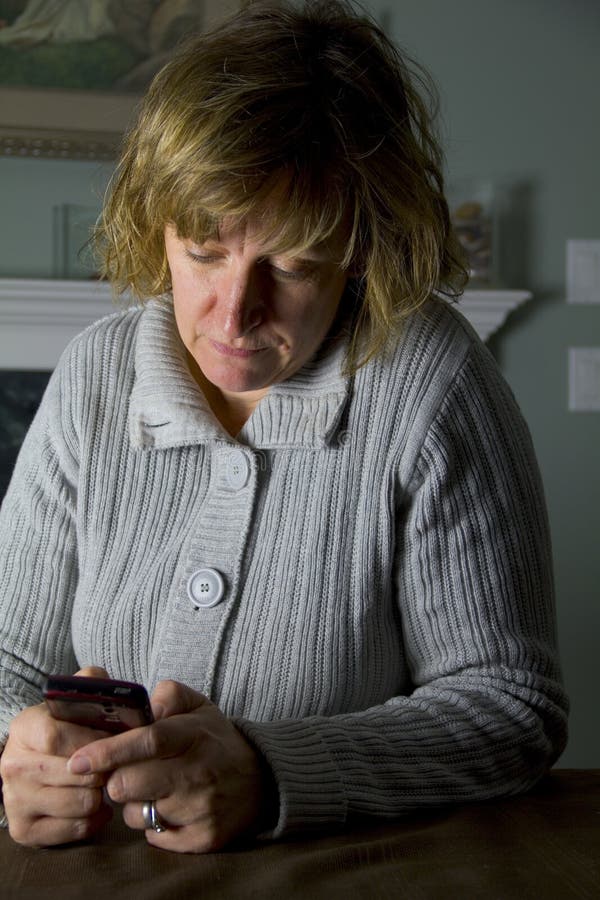 Stressed Woman Texting on a Cell Phone Stock Image - Image of shadows ...