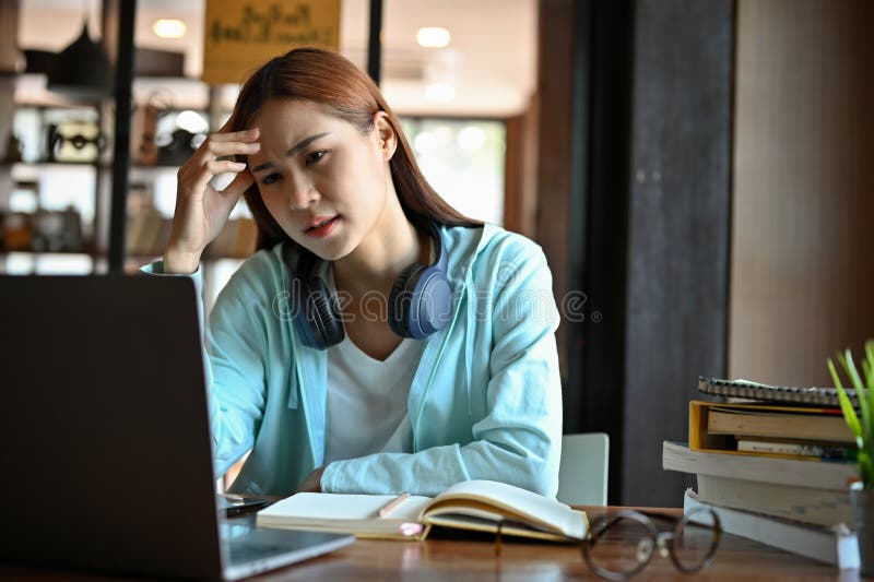 Stressed Young Asian Female College Student Having a Problem on Her ...