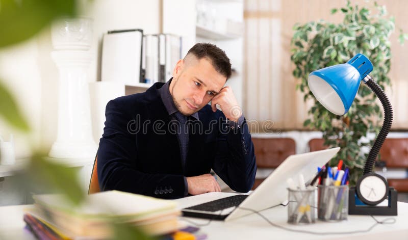 Stressed Young Man Working in Office Stock Photo - Image of business ...