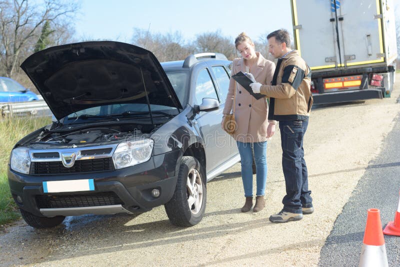 Stressed Young Woman Breakdown with Car and Assistance Mechanic Stock ...