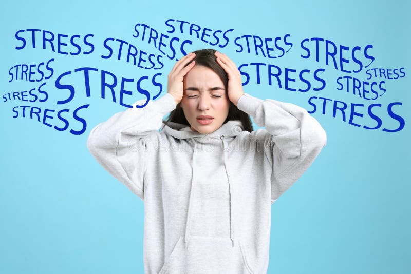 Stressed Young Woman and Text on Light Blue Background Stock Photo ...