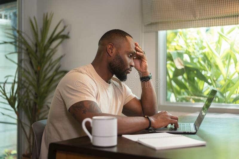 Stressful African American Man Working in His Home Stock Photo - Image ...