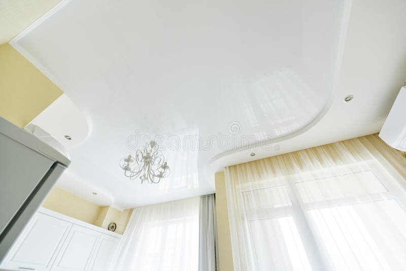 Stretch Ceiling in the Kitchen. Stretch Ceiling White and Complex Shape ...