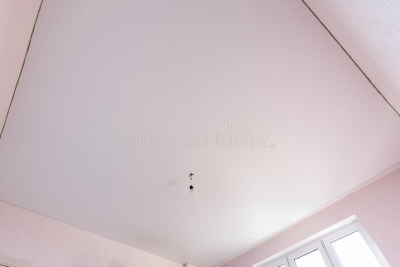 Stretch Matte White Ceiling in the Interior of a Square Room Stock ...