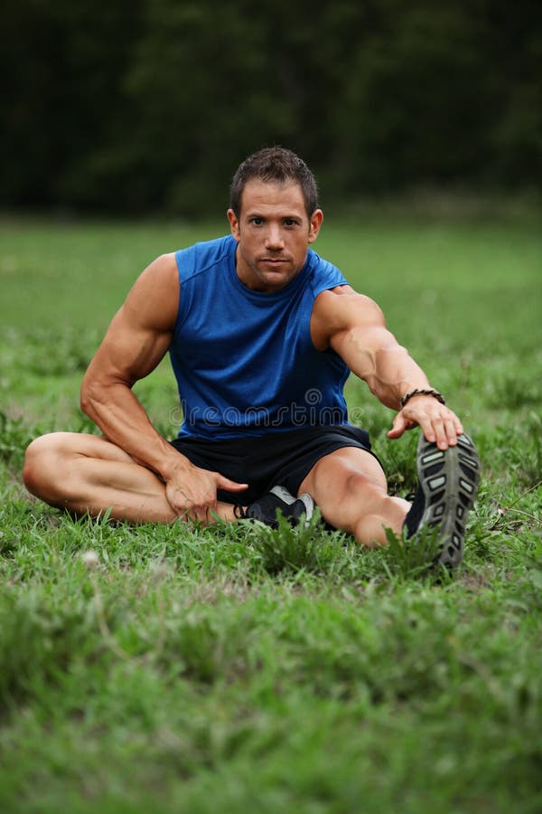 Stretch on the Playing Field Stock Image - Image of lawn, park: 32164945