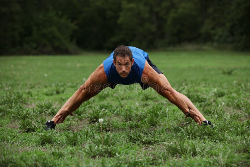 Stretch on the Playing Field Stock Image - Image of horizontal, adult ...