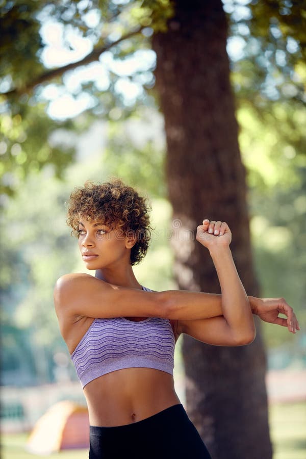 Stretch, Stretch and Stretch Some More. a Beautiful Young Woman ...