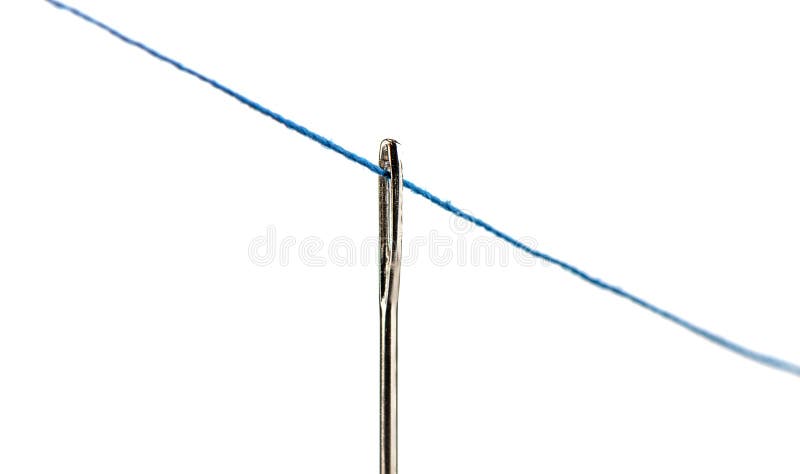 Stretched Blue Thread through the Eye of a Needle Over a White ...