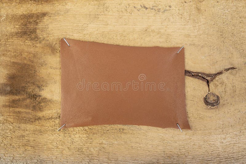 Stretched Brown Leather Rectangle Stapled on Weathered Wood , Abstract ...