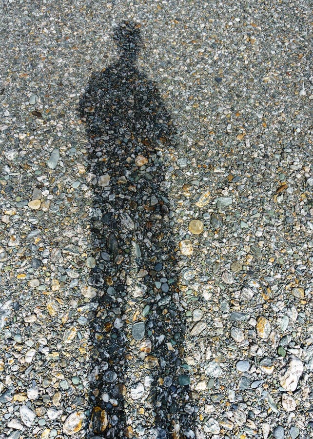 Stretched Man Shadow on Dry River Bed. Stock Image - Image of field ...
