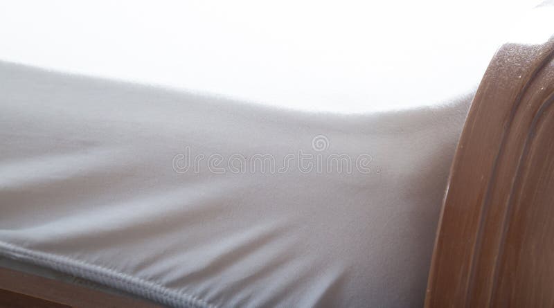 Stretched White Sheets are Stretched on the Mattress Stock Photo ...