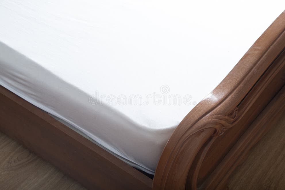Stretched White Sheets are Stretched on the Mattress Stock Photo ...