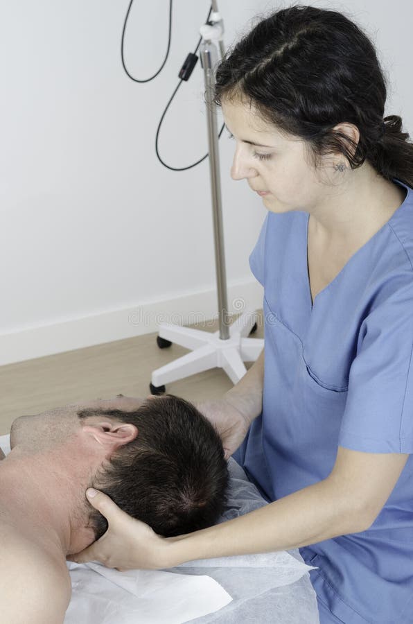Stretching cervical neck. stock photo. Image of patient - 58967984