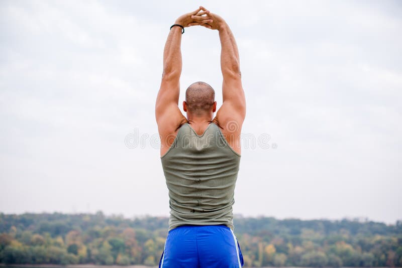Stretching with hands up stock photo. Image of caucasian - 110275756