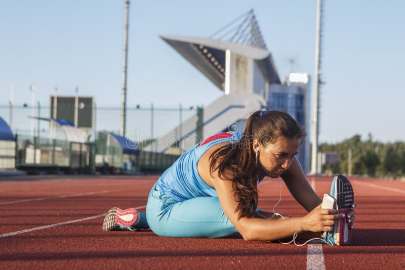 Stretching before Jogging Workout Stock Image - Image of trainer ...