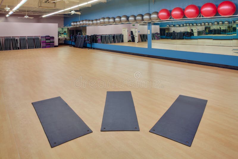 Stretching Mats and Exercise Balls in Gym Stock Image - Image of strong ...