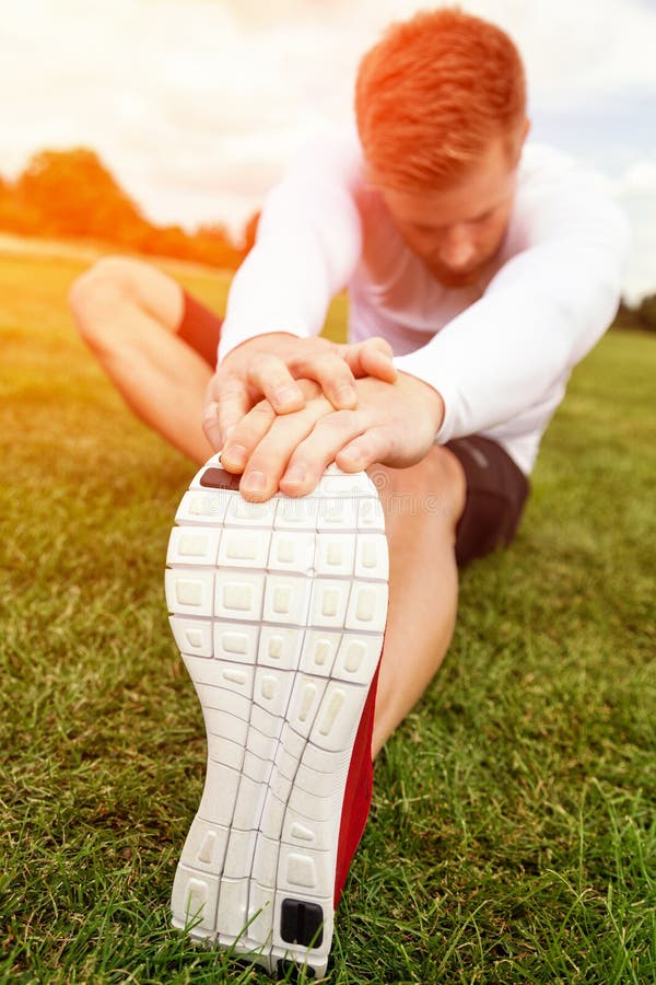 Stretching Out in the Park on a Sunny Day Stock Photo - Image of nature ...