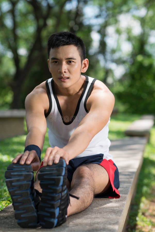 Stretching outside stock image. Image of athlete, sportive - 32672571
