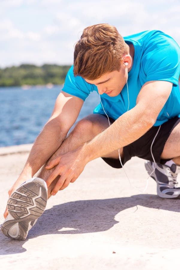 Girl Stretching before Running in City Marathon Stock Photo - Image of ...