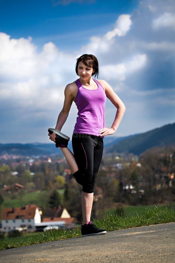 Stretching woman stock image. Image of fields, lifestyles - 24697849